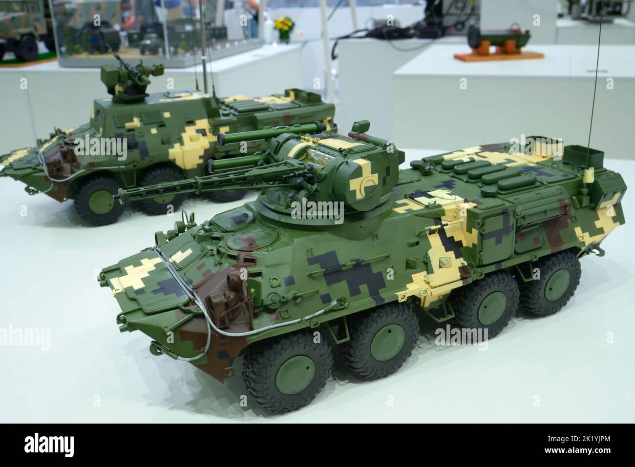 Mini models of Ukrainian armoured personnel carriers placed on counter ...