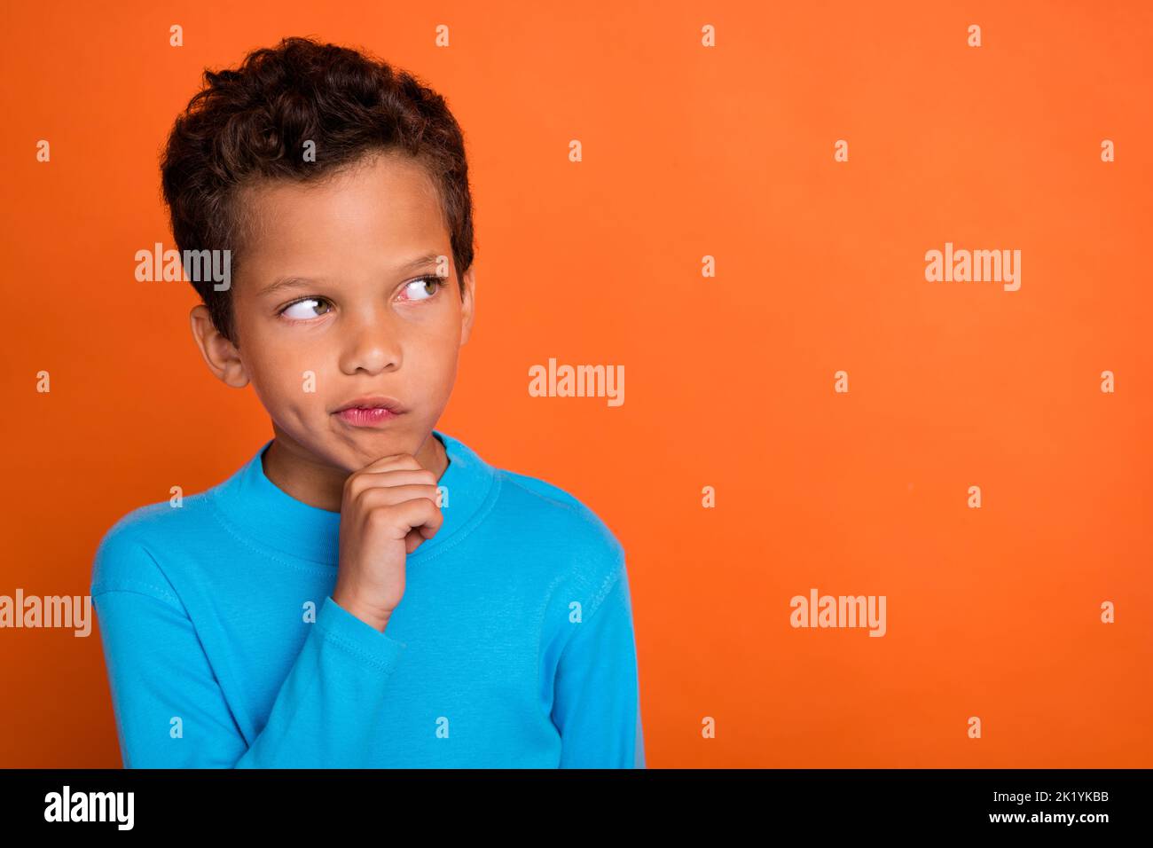Photo of concentrated focused boy look empty space consider decision ...