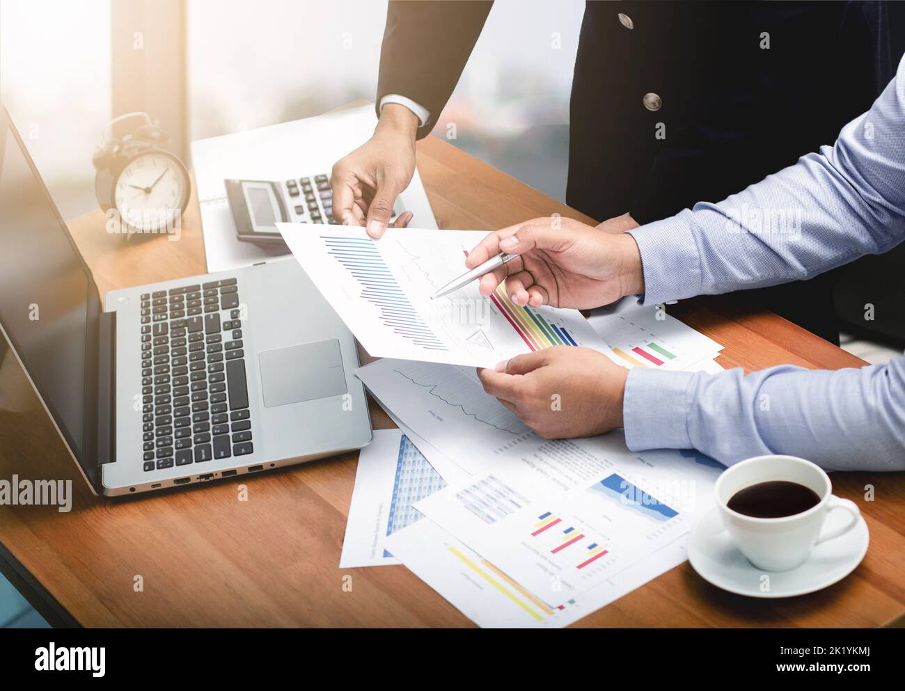 Business team analyzing income charts and graphs,Financial analysis and ...