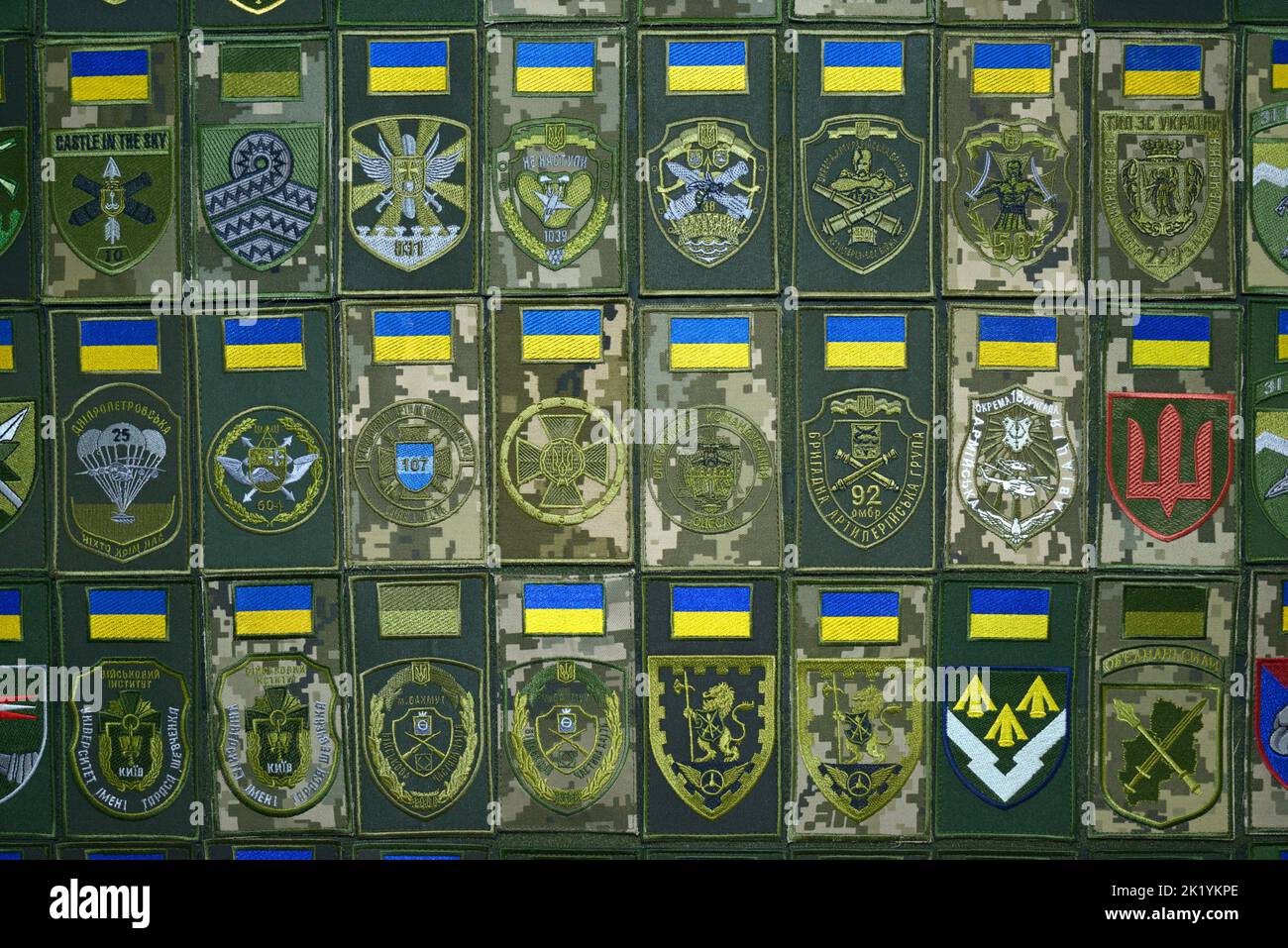 New modern chevrons of Ukrainian army presented on stand. Arms and ...