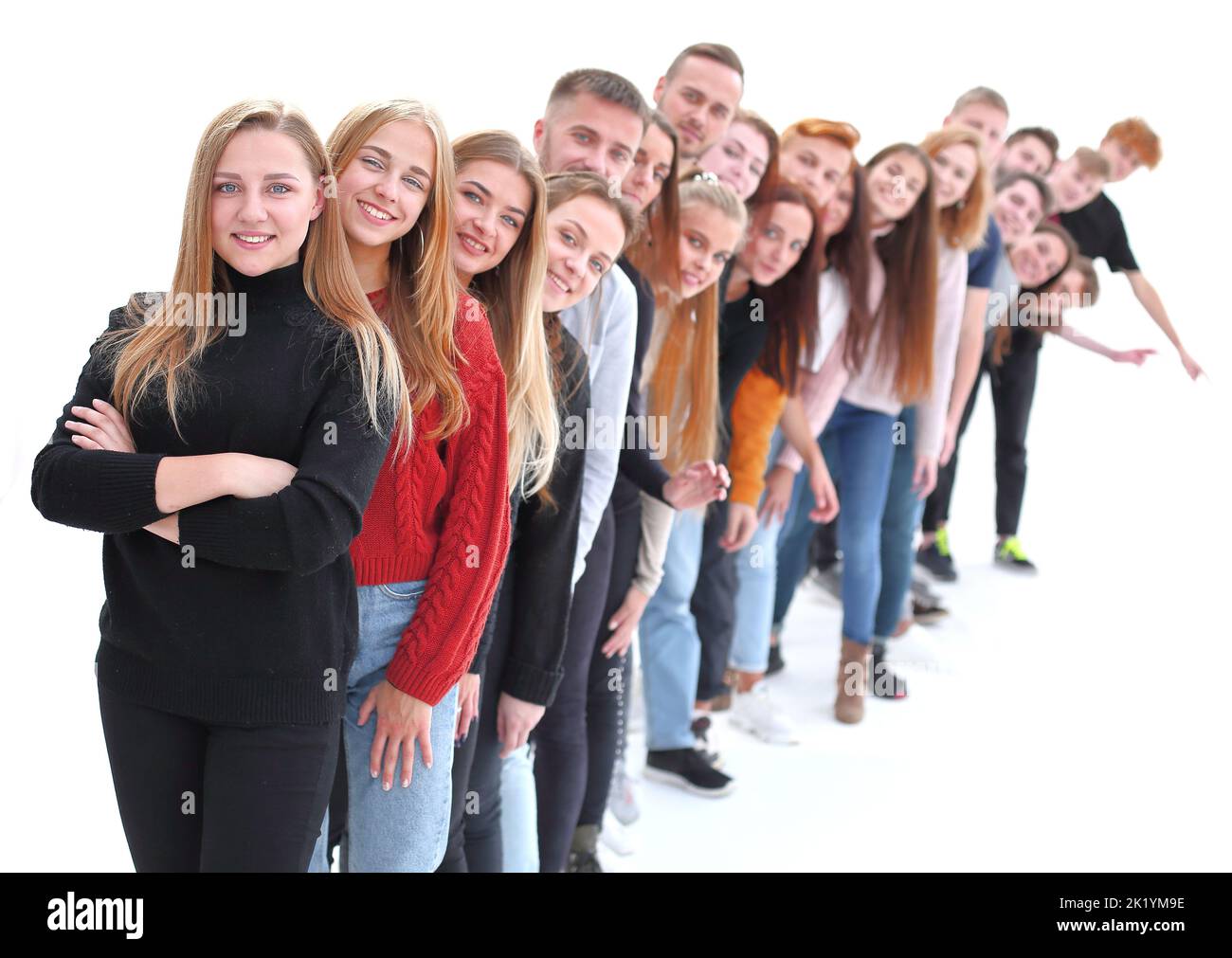 group of cheerful young people standing behind each other Stock Photo ...