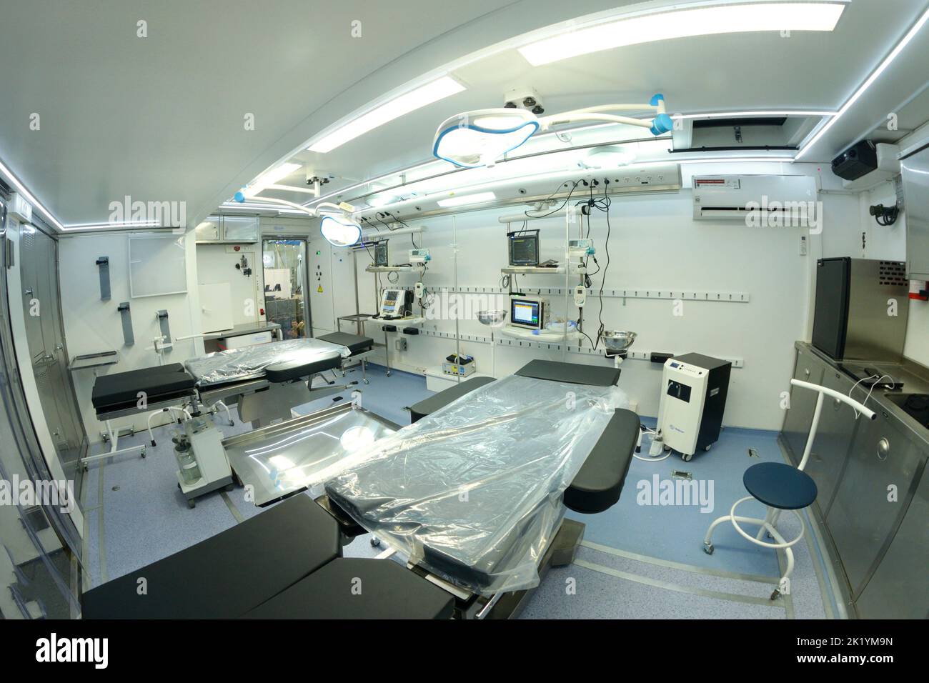Interior of a new military mobile hospital operation tables, reviving ...