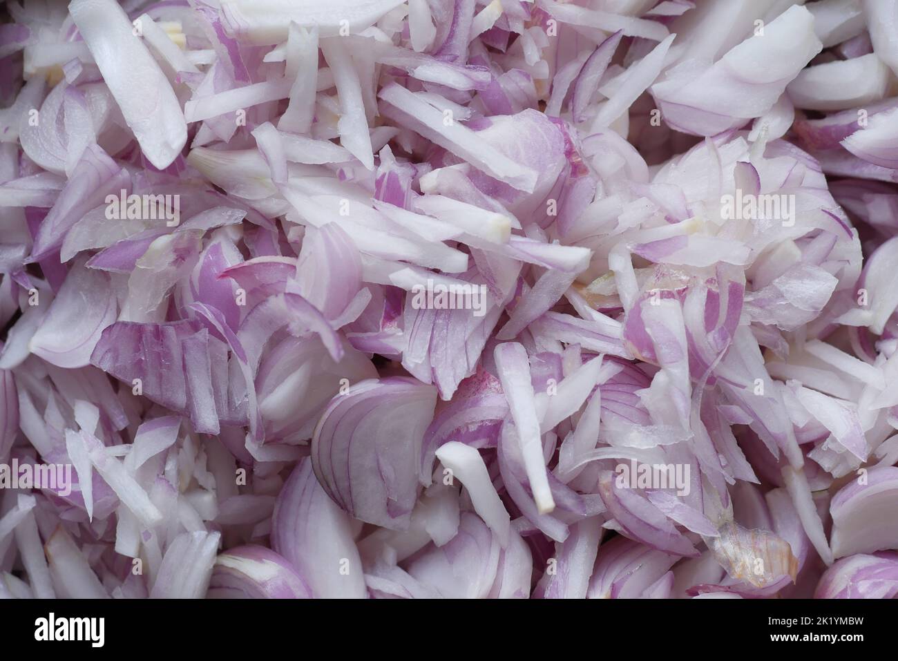 slow motion of slice of red onion falling Stock Photo - Alamy