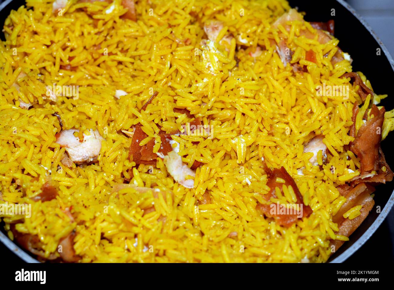 Pieces of Chicken shawarma with yellow Basmati rice, Syrian bread and ...