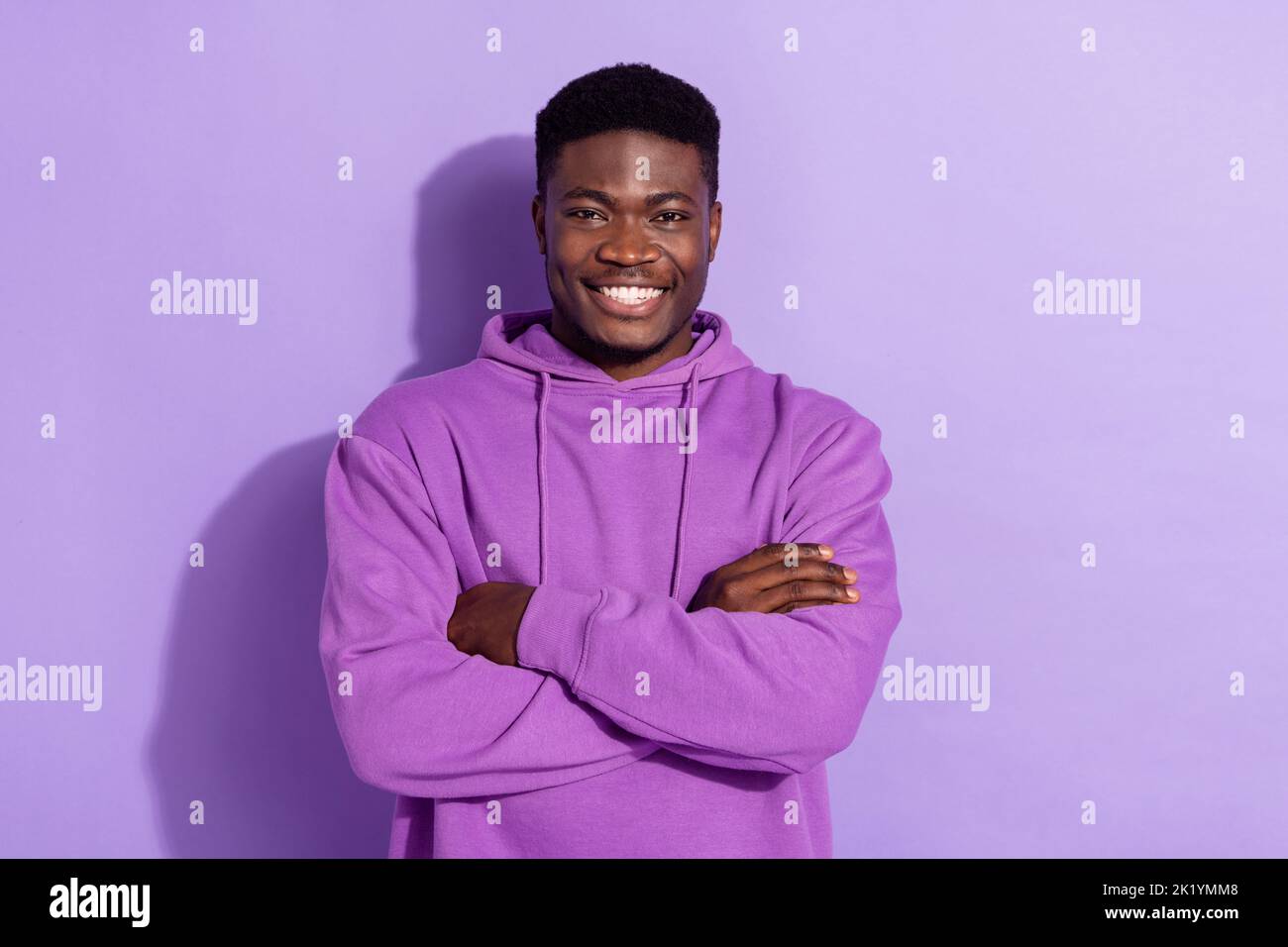 Portrait of satisfied man crossed arms beaming smile look camera ...