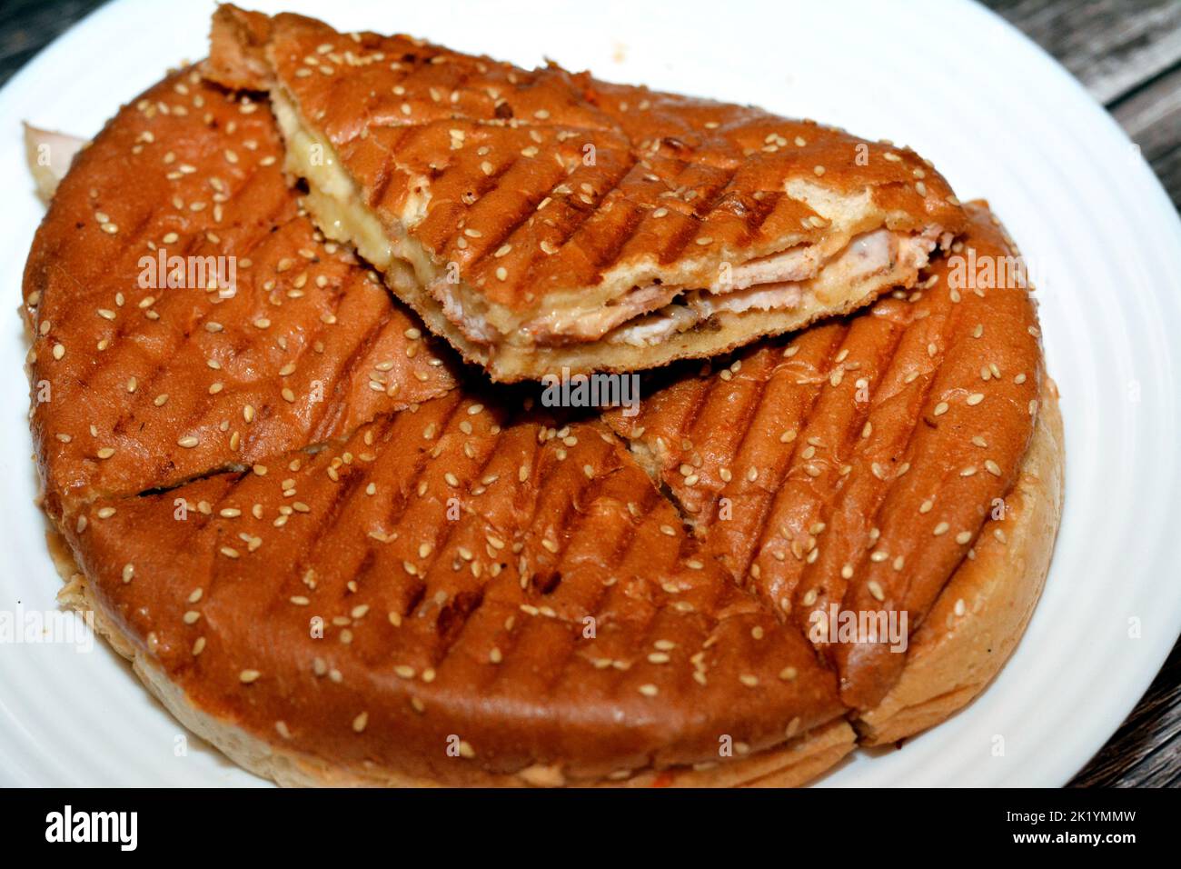 Chicken Shawarma with Mozzarella cheese pie in a bread with sesame ...