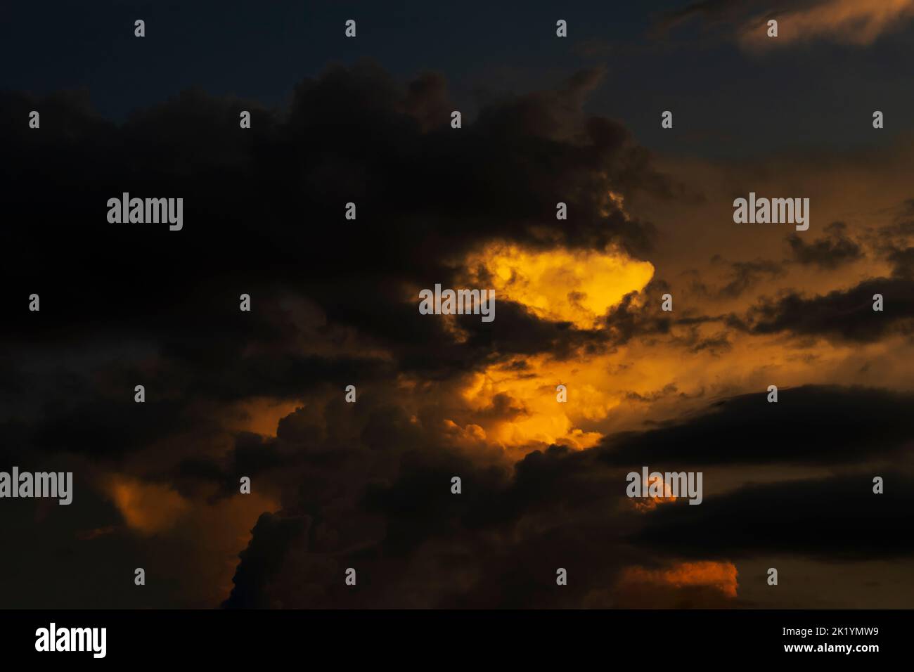 Amazingly beautiful evening when the sun is setting dark black yellow ...