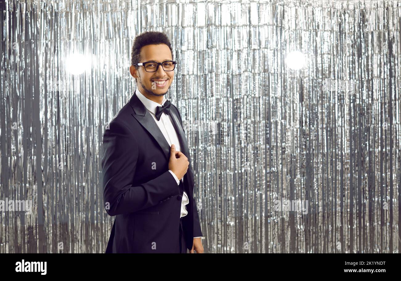 Portrait of attractive and elegant showman or host of festive event on ...