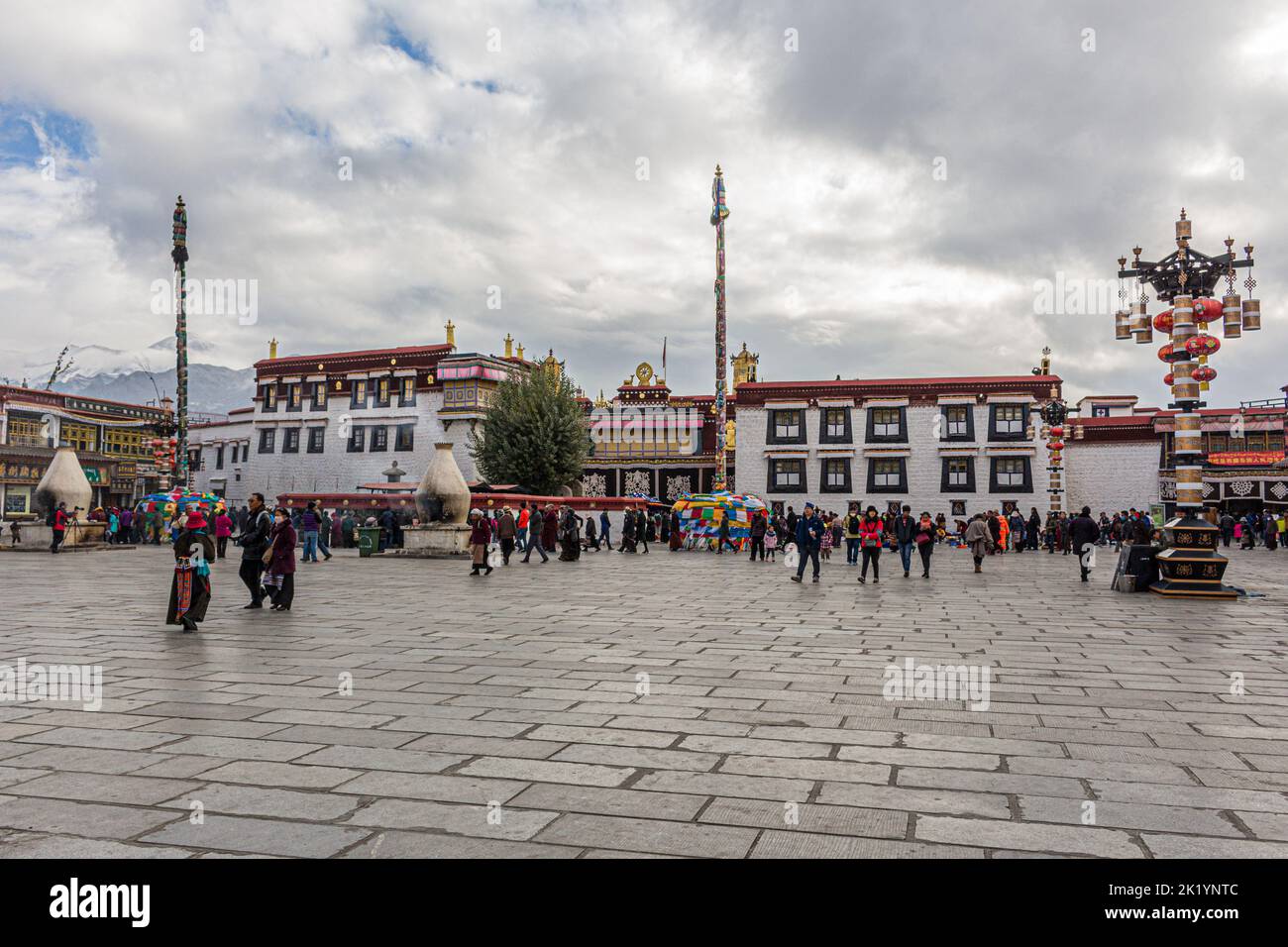 Tibetan buddhist pilgrims undertake the Kora clockwise circumambulation ...