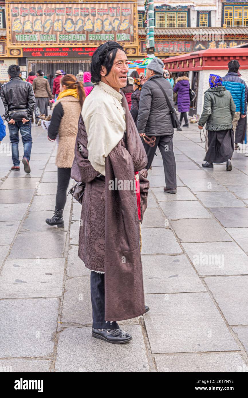 Tibetan buddhist pilgrims undertake the Kora clockwise circumambulation ...