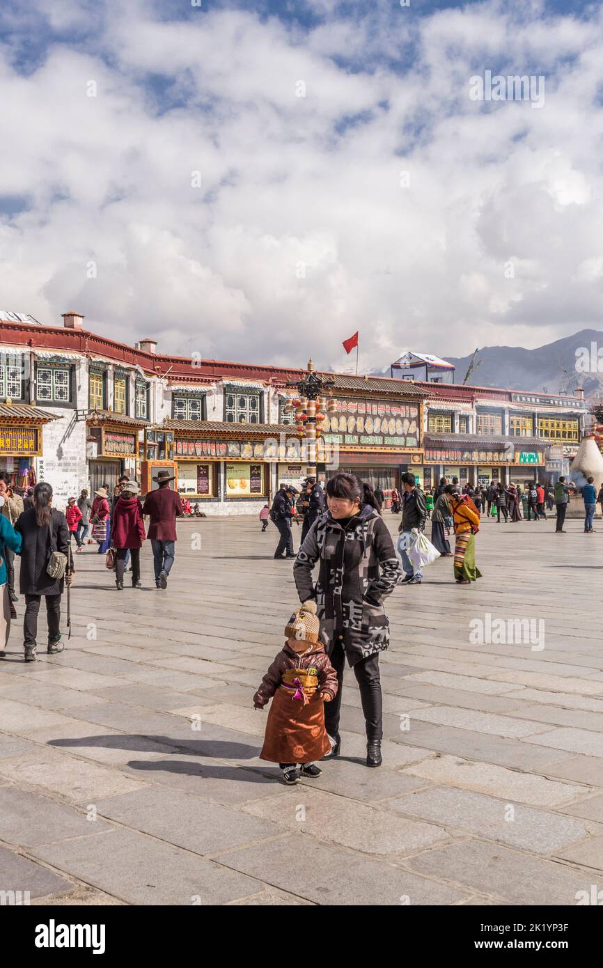 Tibetan buddhist pilgrims undertake the Kora clockwise circumambulation ...