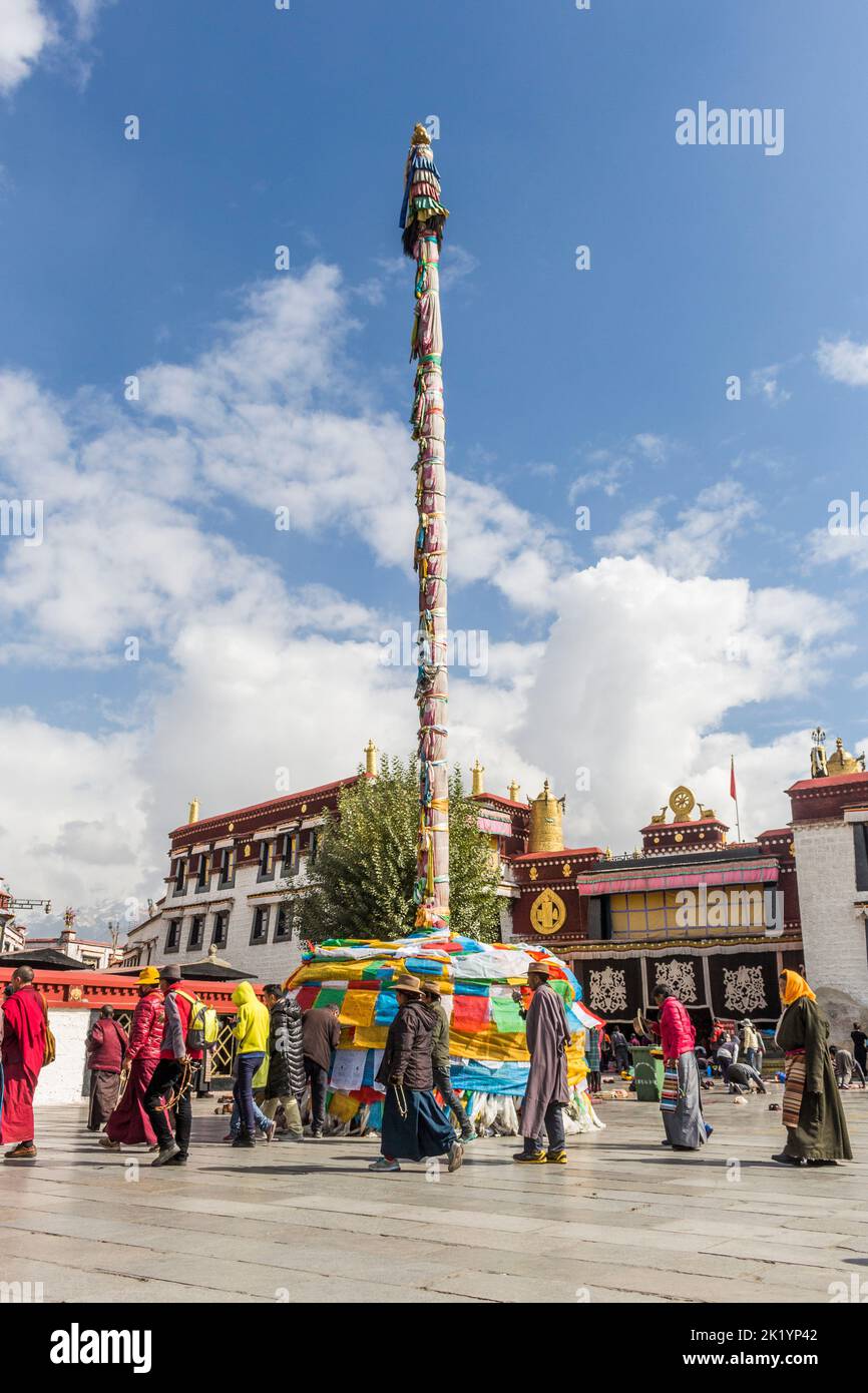 Tibetan buddhist pilgrims undertake the Kora clockwise circumambulation ...