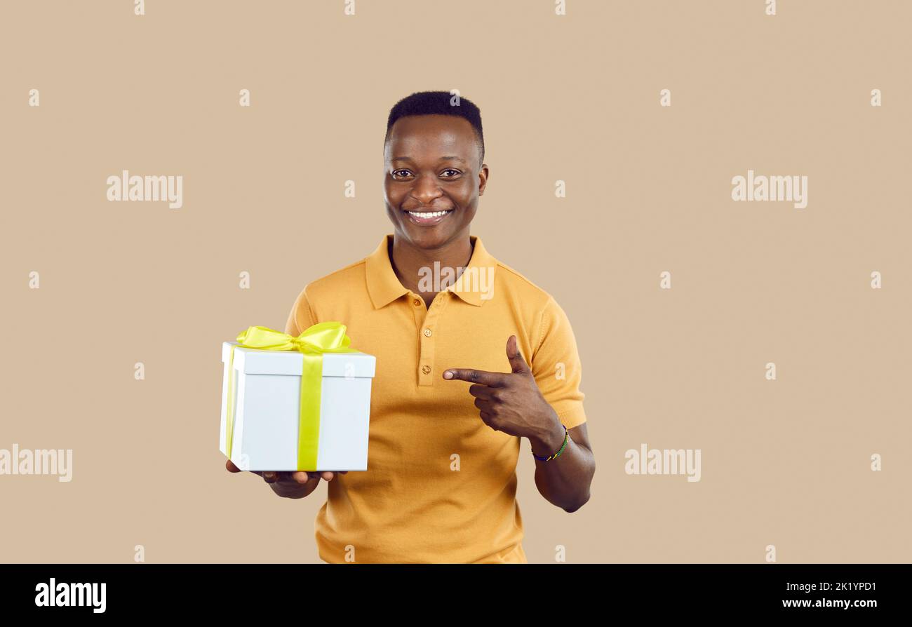 Pointing at gift hi-res stock photography and images - Alamy