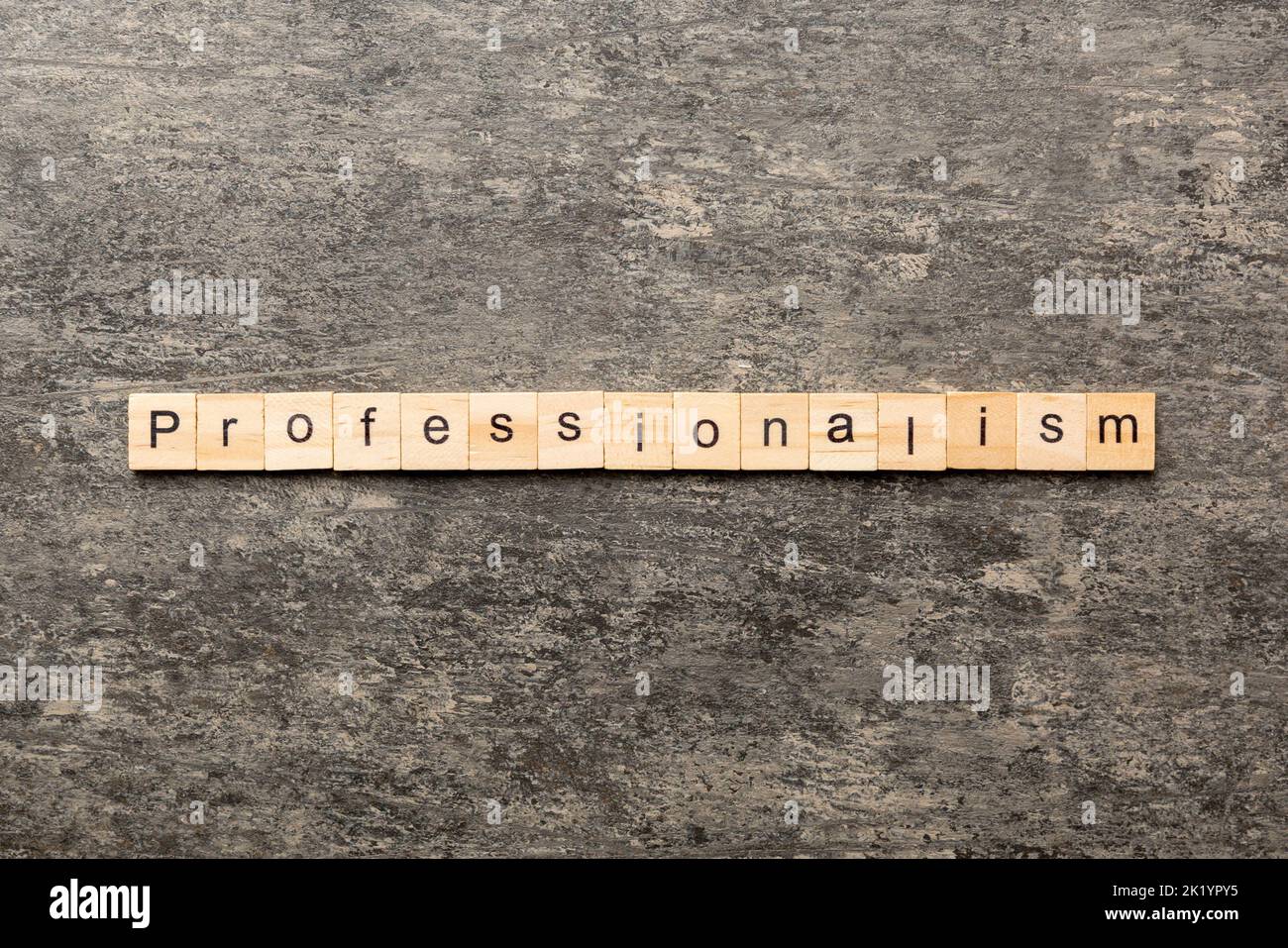 Professionalism word written on wood block. Professionalism text on ...