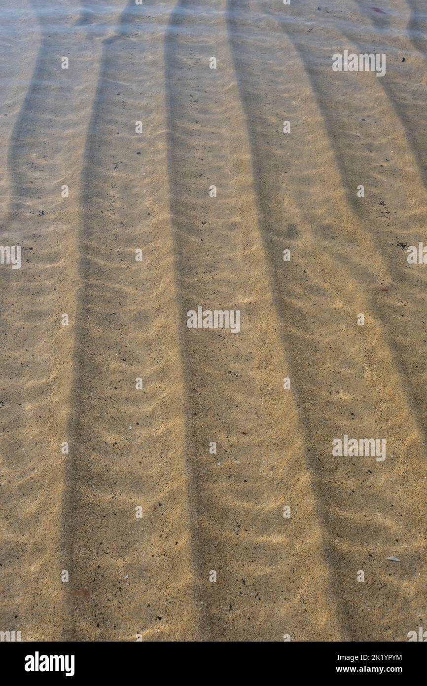 Wave form of sand through water flow hi-res stock photography and ...