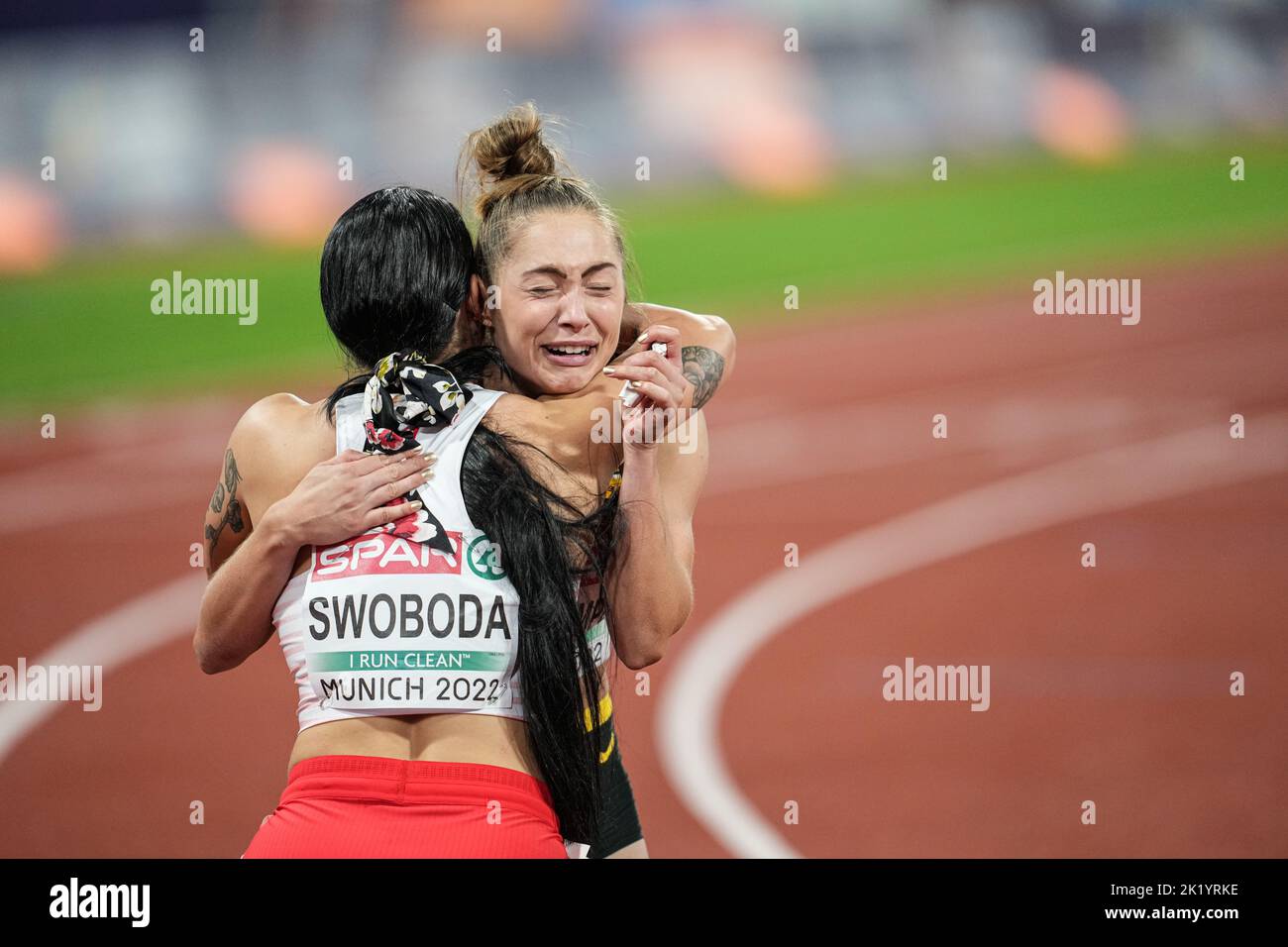 Gina Lückenkemper with her country's flag as the winner of the 100 ...