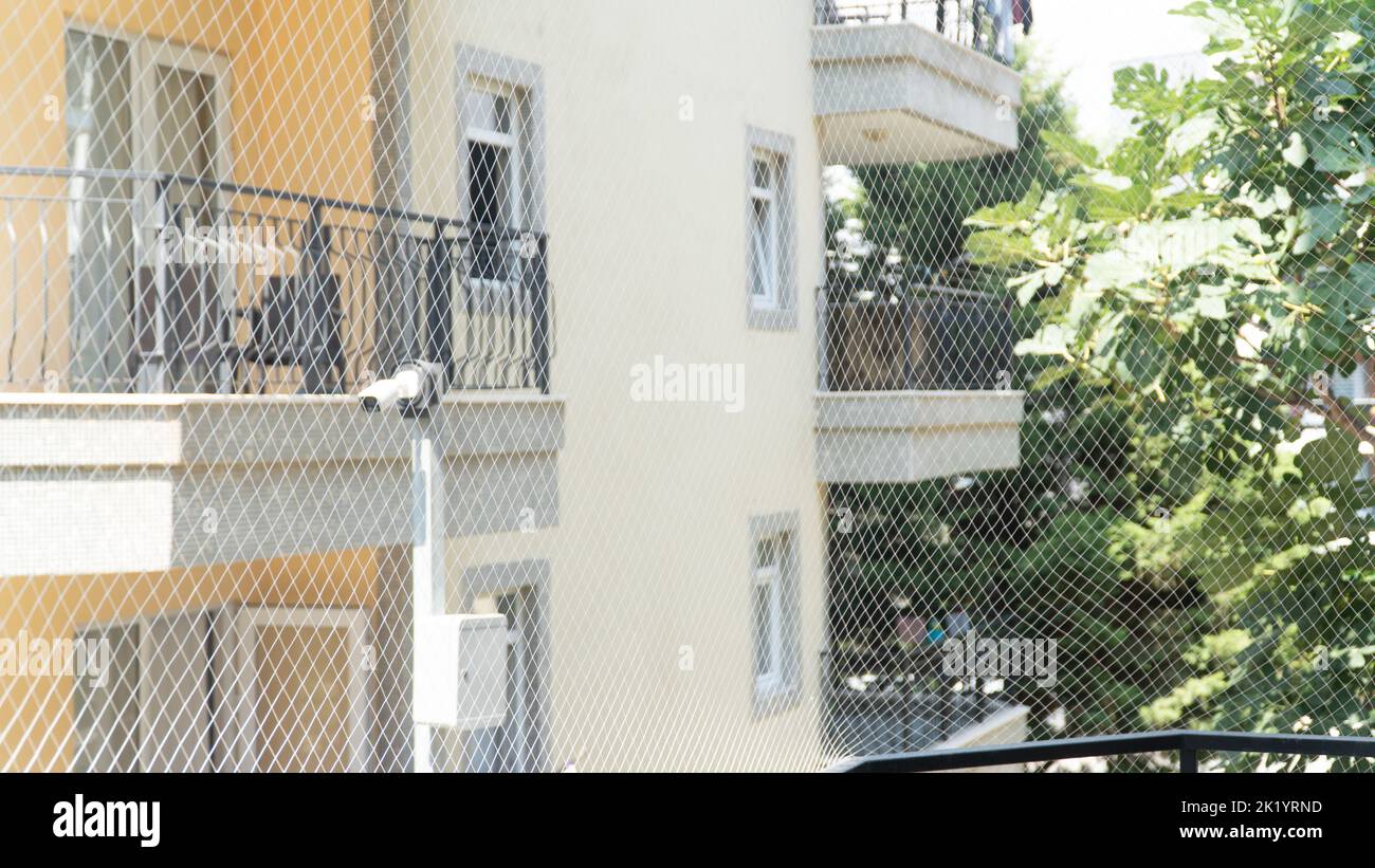 Cat safety net in balcony. Balcony net for cats Stock Photo - Alamy