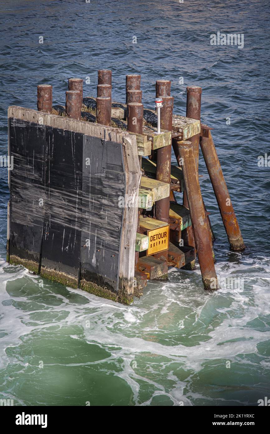 A closeup shot of a dock piling off the coast of cape cod at a ferry ...