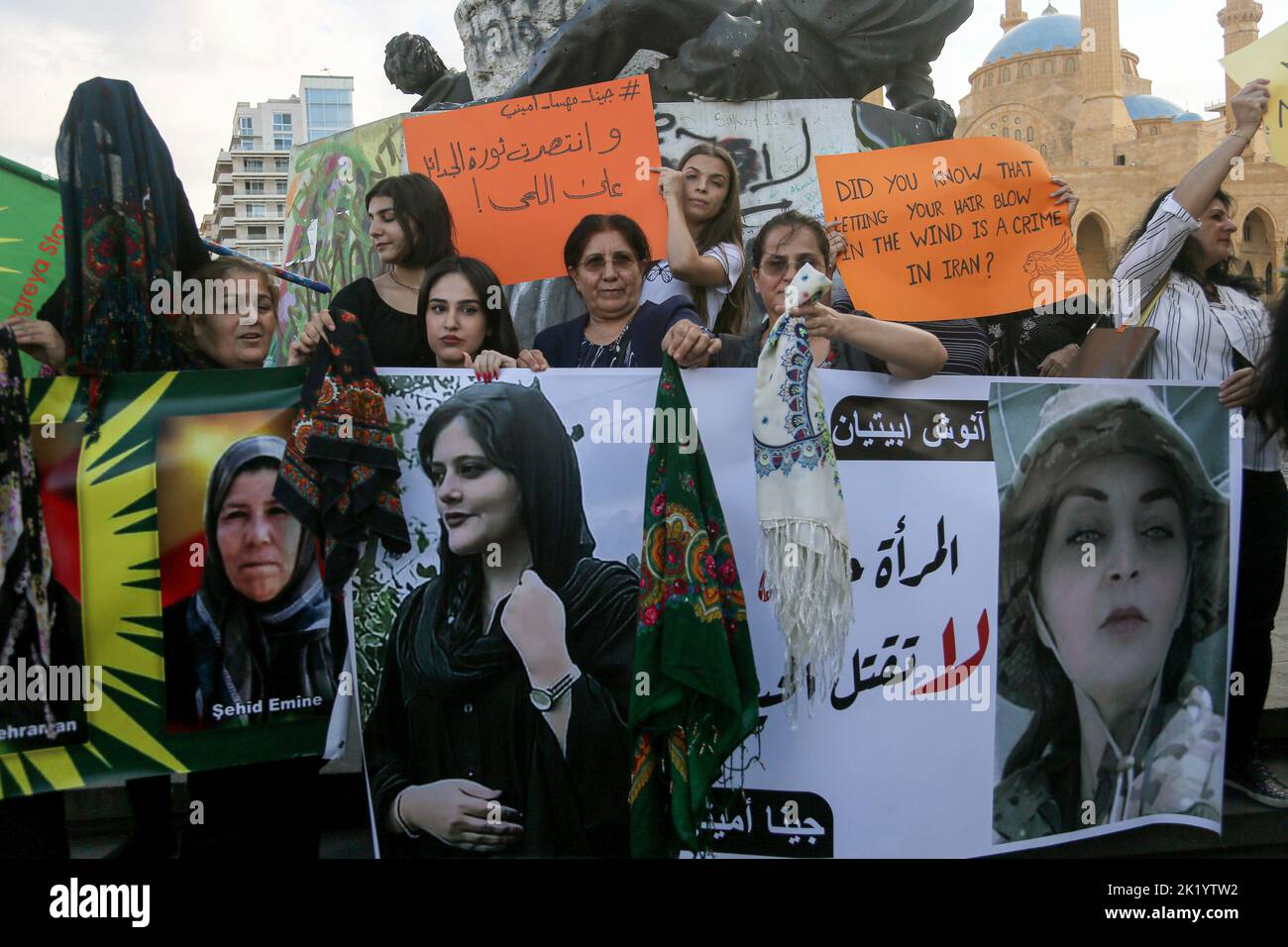 Beirut, Lebanon. 21st Sep, 2022. Kurdish women wave head scarves while ...