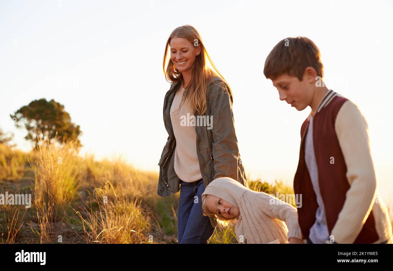 Getting some fresh air with Mom. a happy mother out on a morning walk ...