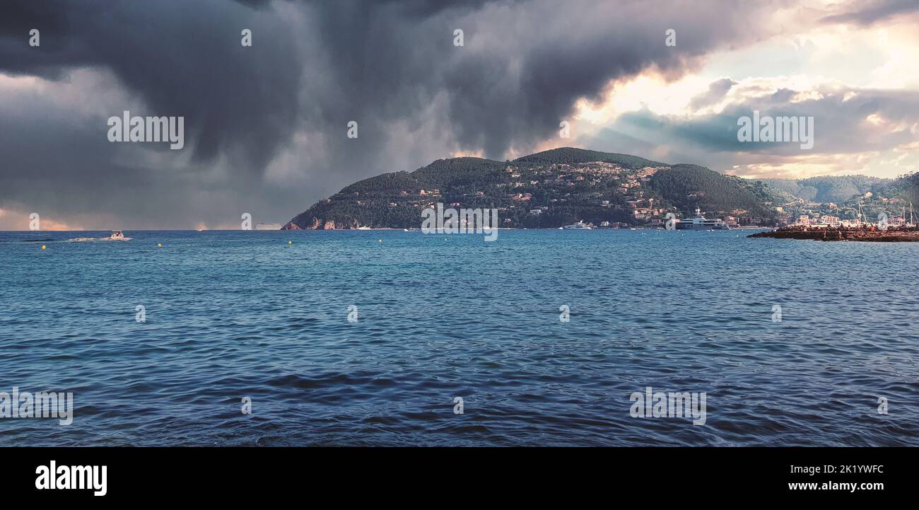 Storm clouds and island, storm Passing over the ocean, dramatic clouds ...