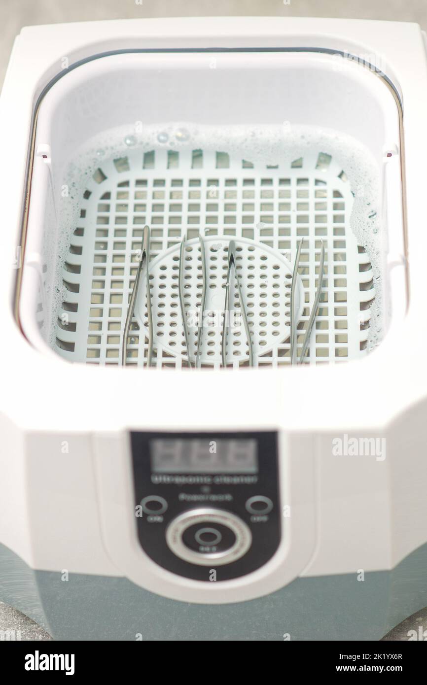 Ultrasonic tools cleaner. Machine for disinfection of tweezers tools ...