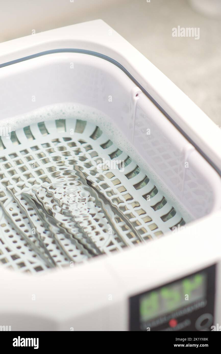 Ultrasonic tools cleaner. Machine for disinfection of tweezers tools ...