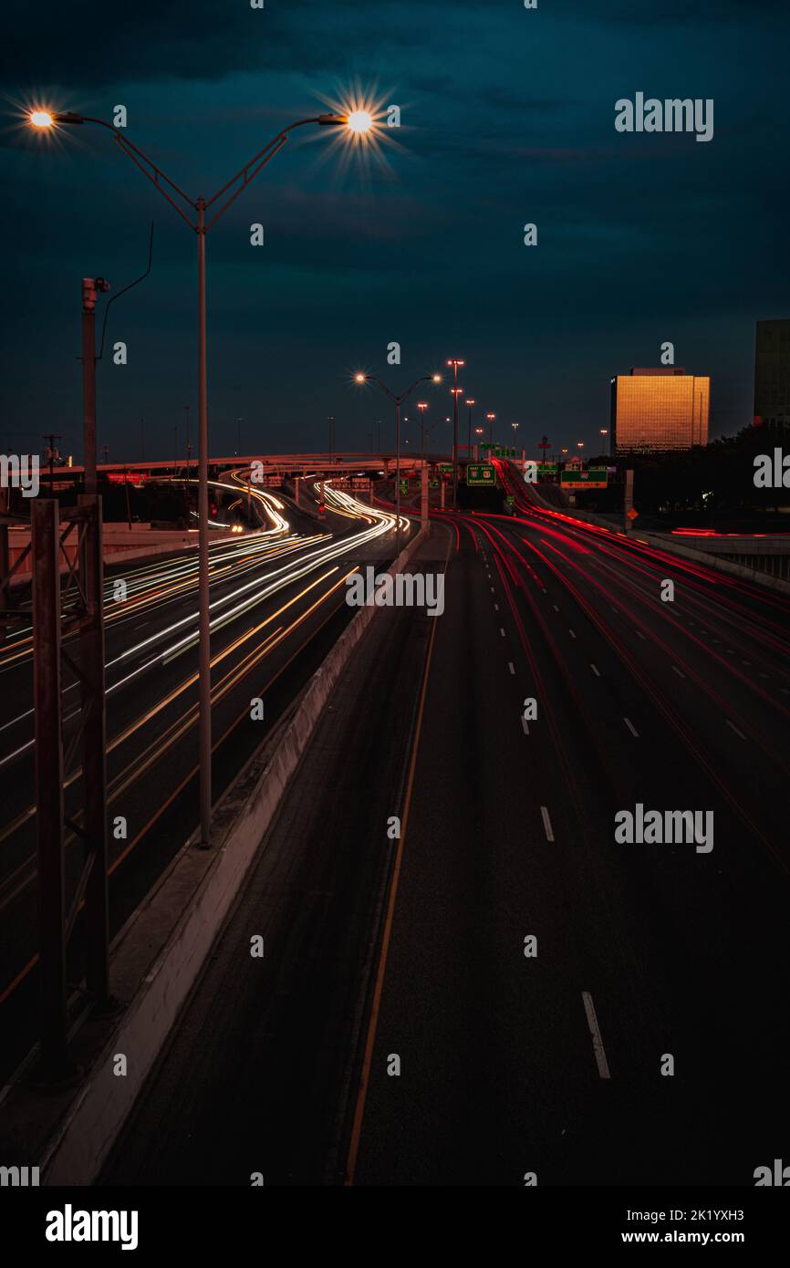 A city highway with street lamps during nighttime Stock Photo - Alamy