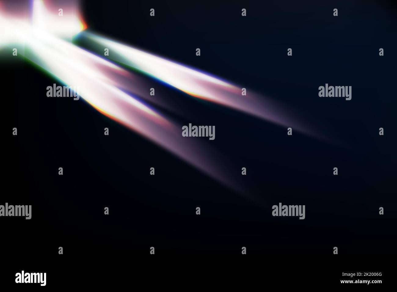 Glare or reflection from water and glass.Rainbow highlights on a black ...