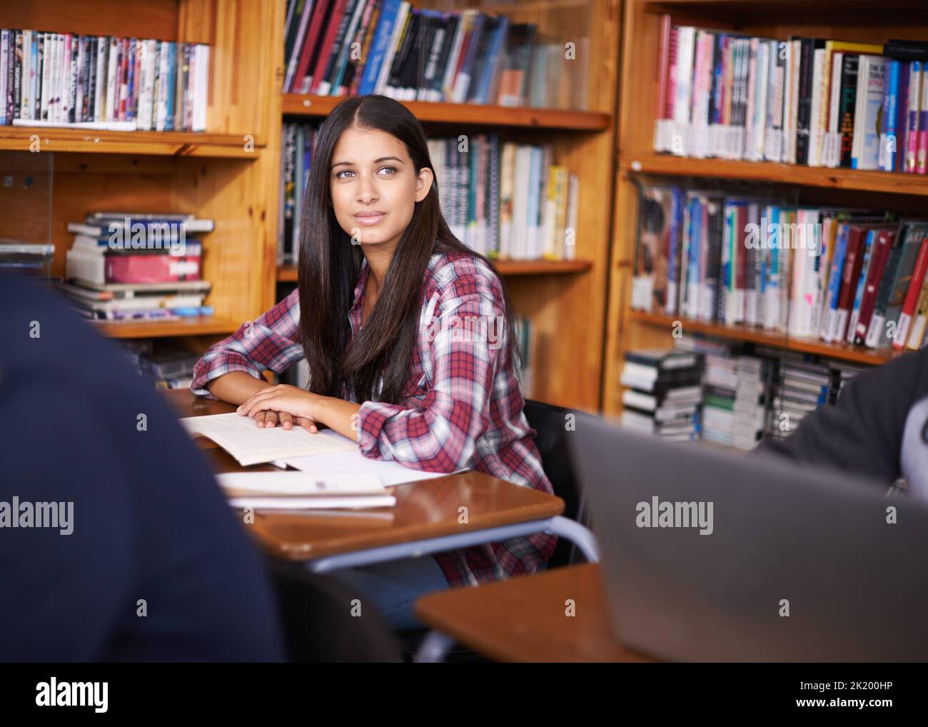 Waiting for her life to begin. an attractrive young student looking ...