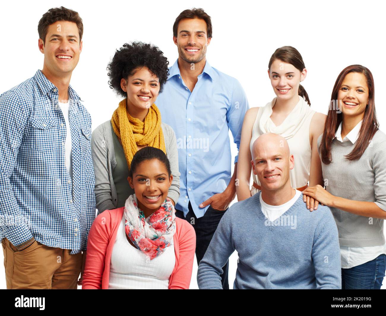 Giving happy smiles. Smiling group of casual young adults together ...