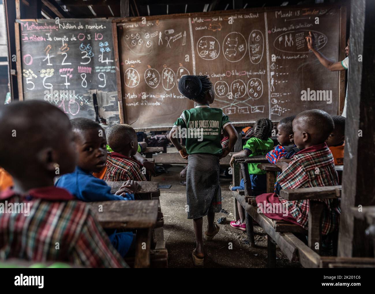 January 20, 2022, Lagos, Nigeria: Children attend classes in a tin shed ...