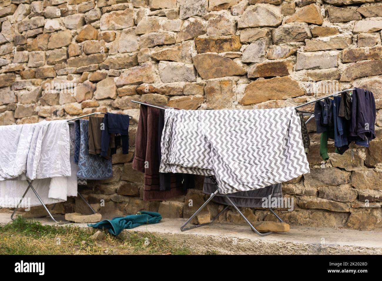 laundry drying outside in the town Stock Photo - Alamy