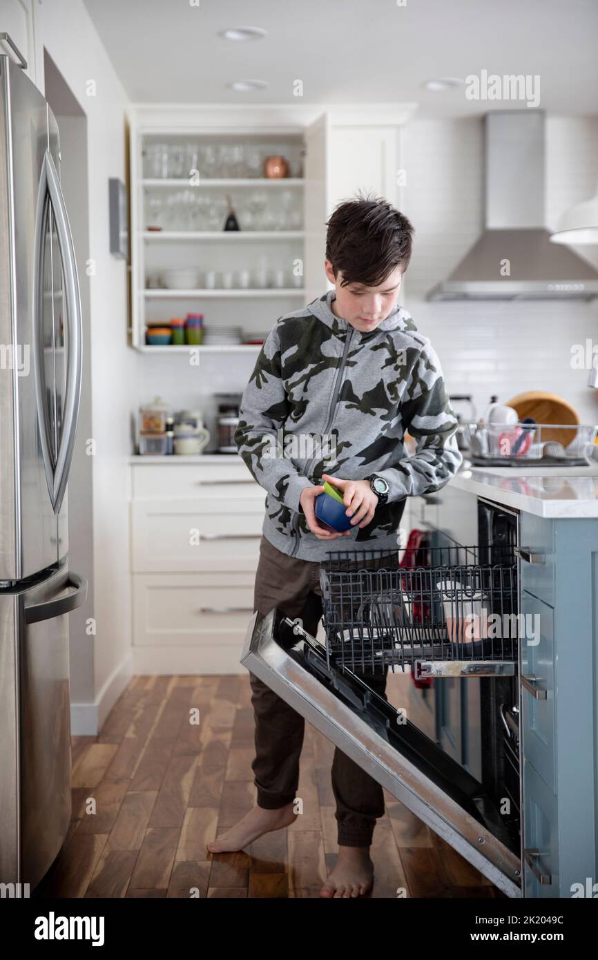 Child dishwasher hi-res stock photography and images - Alamy