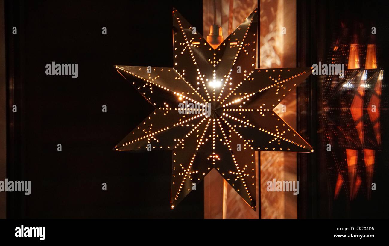 Christmas star, decoration in window Stock Photo - Alamy