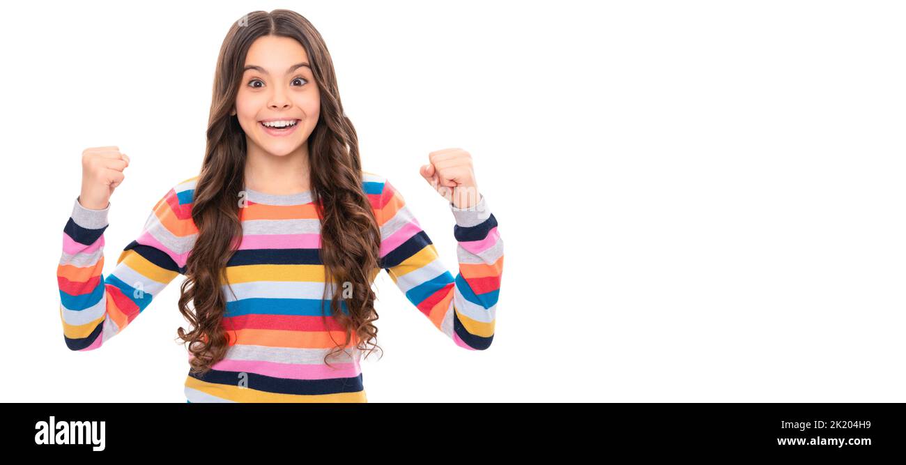 Happy kid smile making winning hand gesture isolated on white, winner ...
