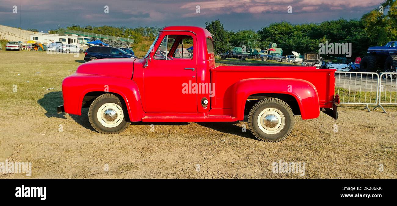 Red american farm car with nature background Stock Photo - Alamy