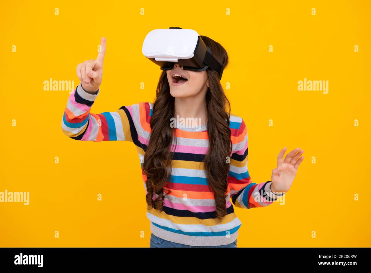 Teen girl wearing virtual reality goggles headset, vr. Connection ...
