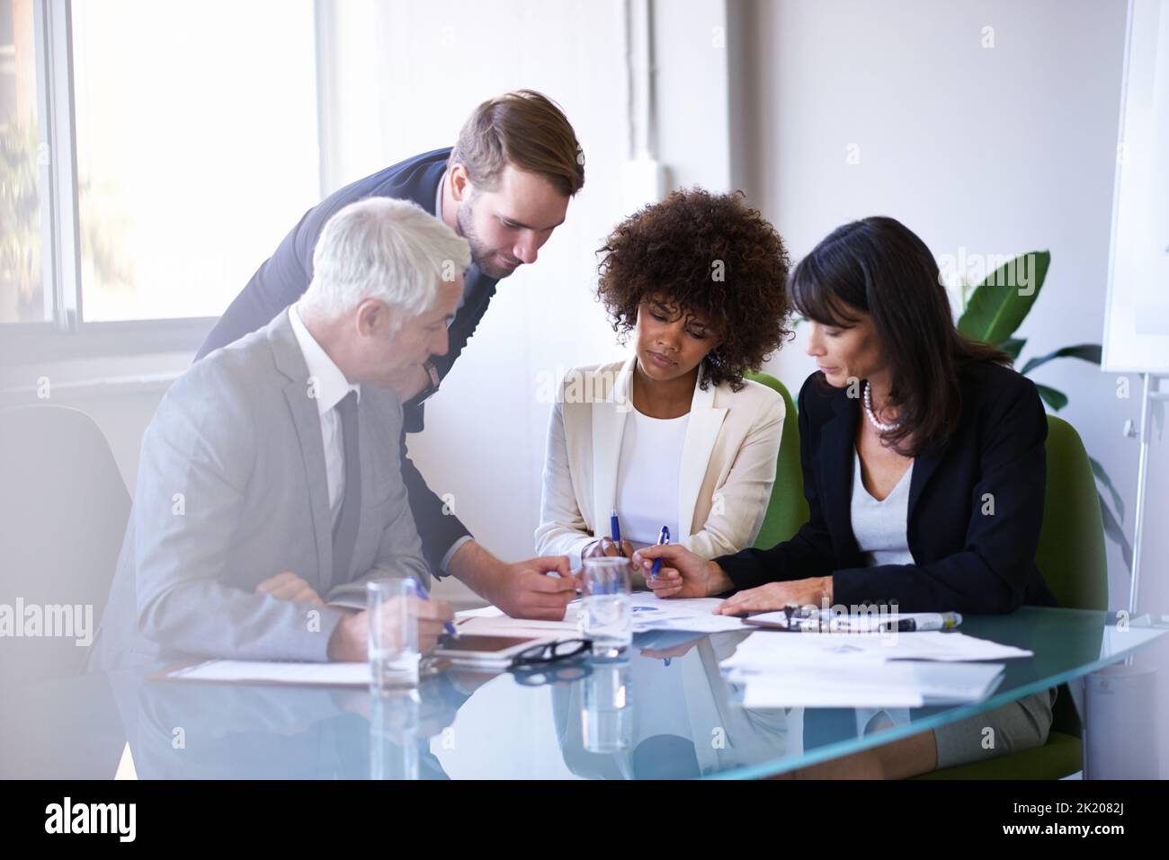 Getting the job done with teamwork. a group of business colleagues ...