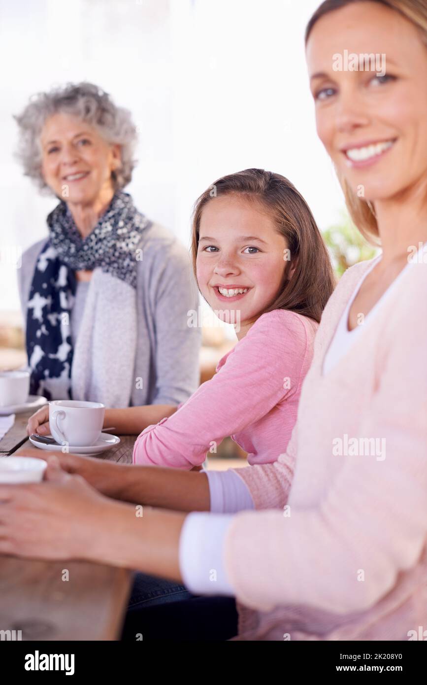 Enjoying a cup of tea and some fresh air. three generations of the ...