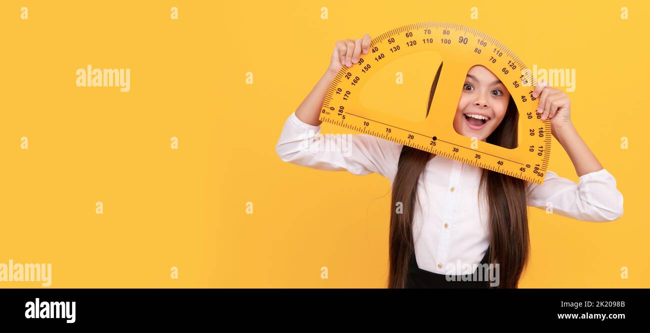 education for child. mathematics. cheerful teen girl hold protractor ...