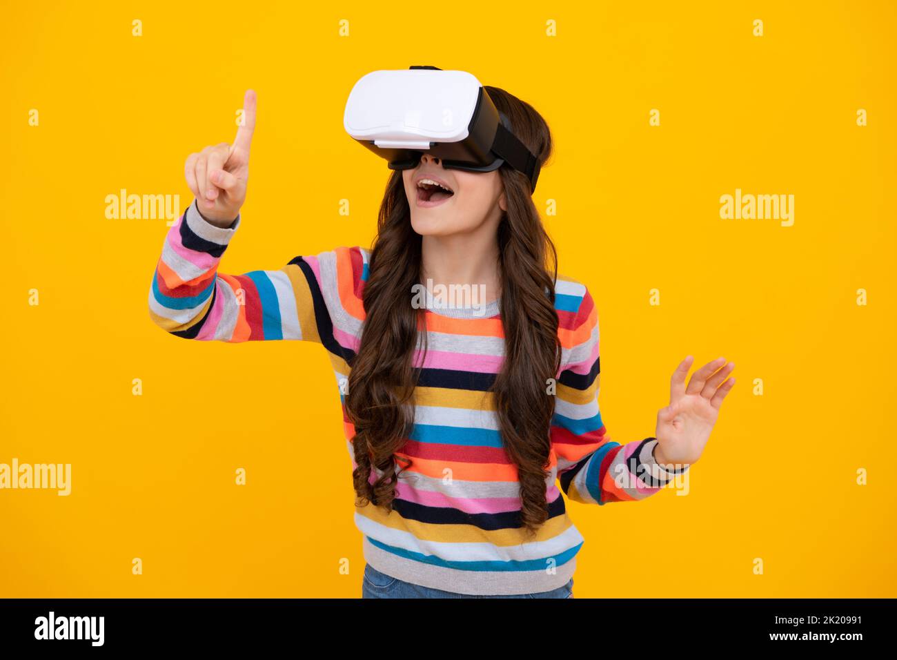 Teen girl wearing virtual reality goggles headset, vr. Connection ...