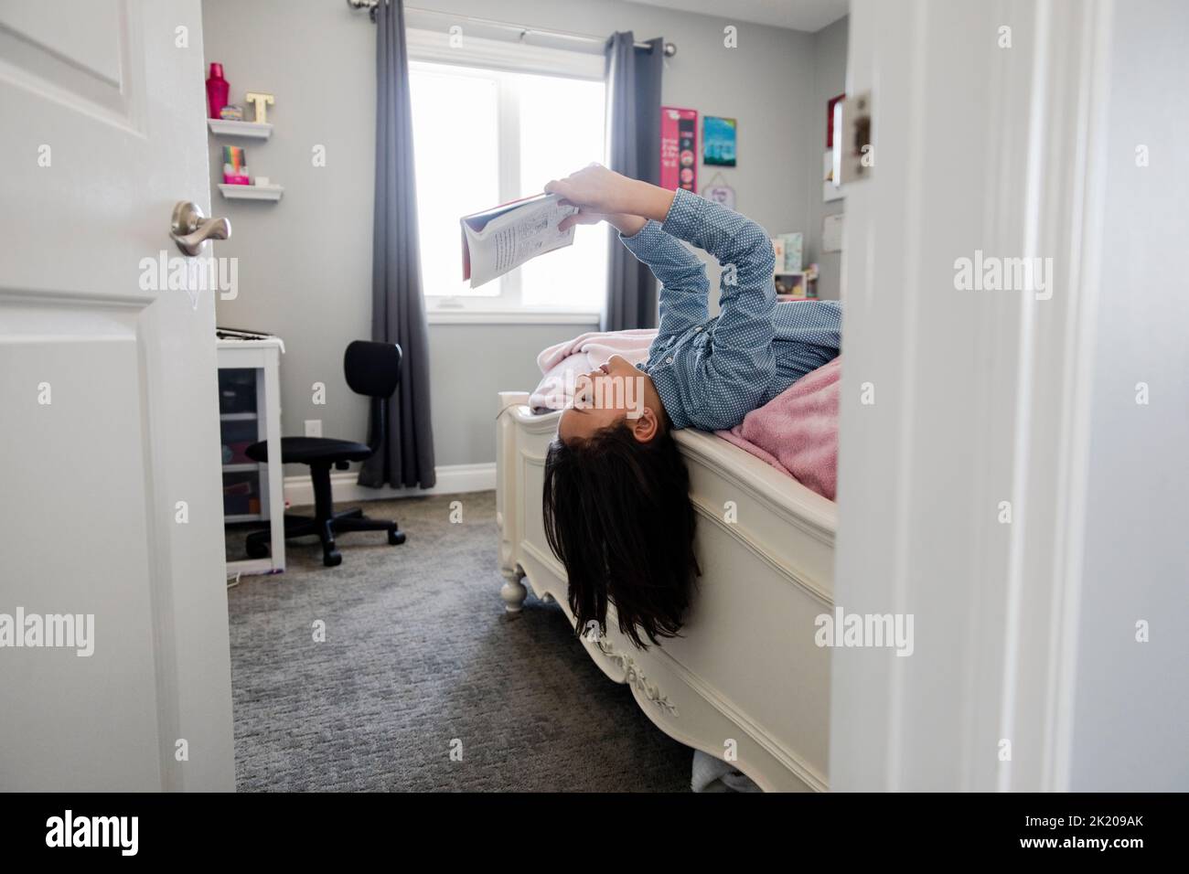 Reading upside down book hi-res stock photography and images - Alamy