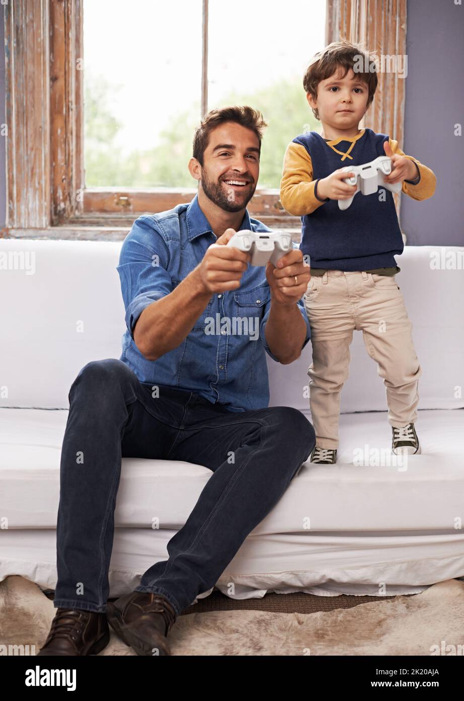 I taught Dad everything he knows. A handsome father and his cute son ...
