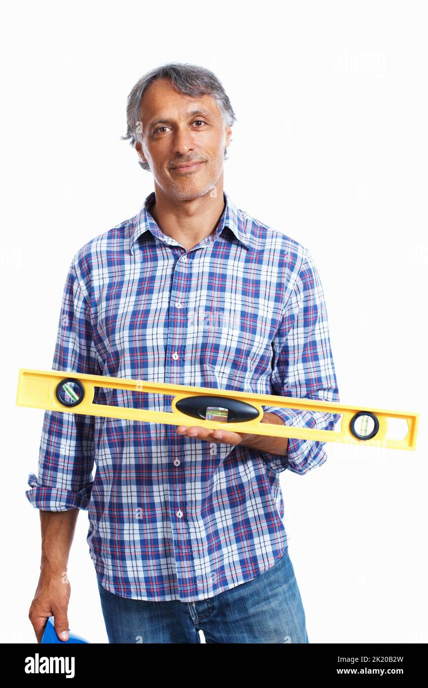 Construction worker with spirit-level. Male construction worker with ...