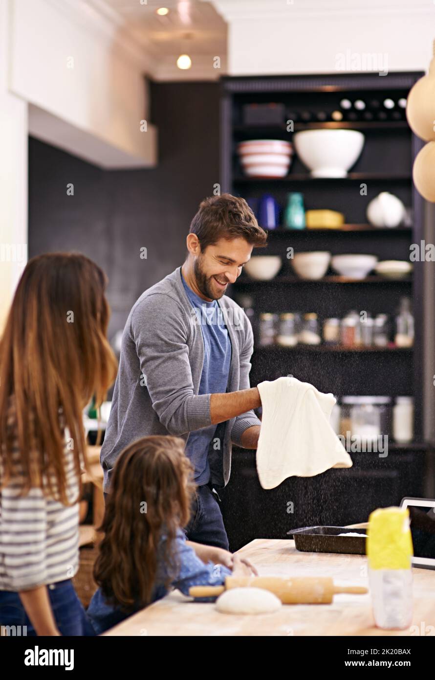 Dads about to show off his pizza moves...a handsome man showing his ...
