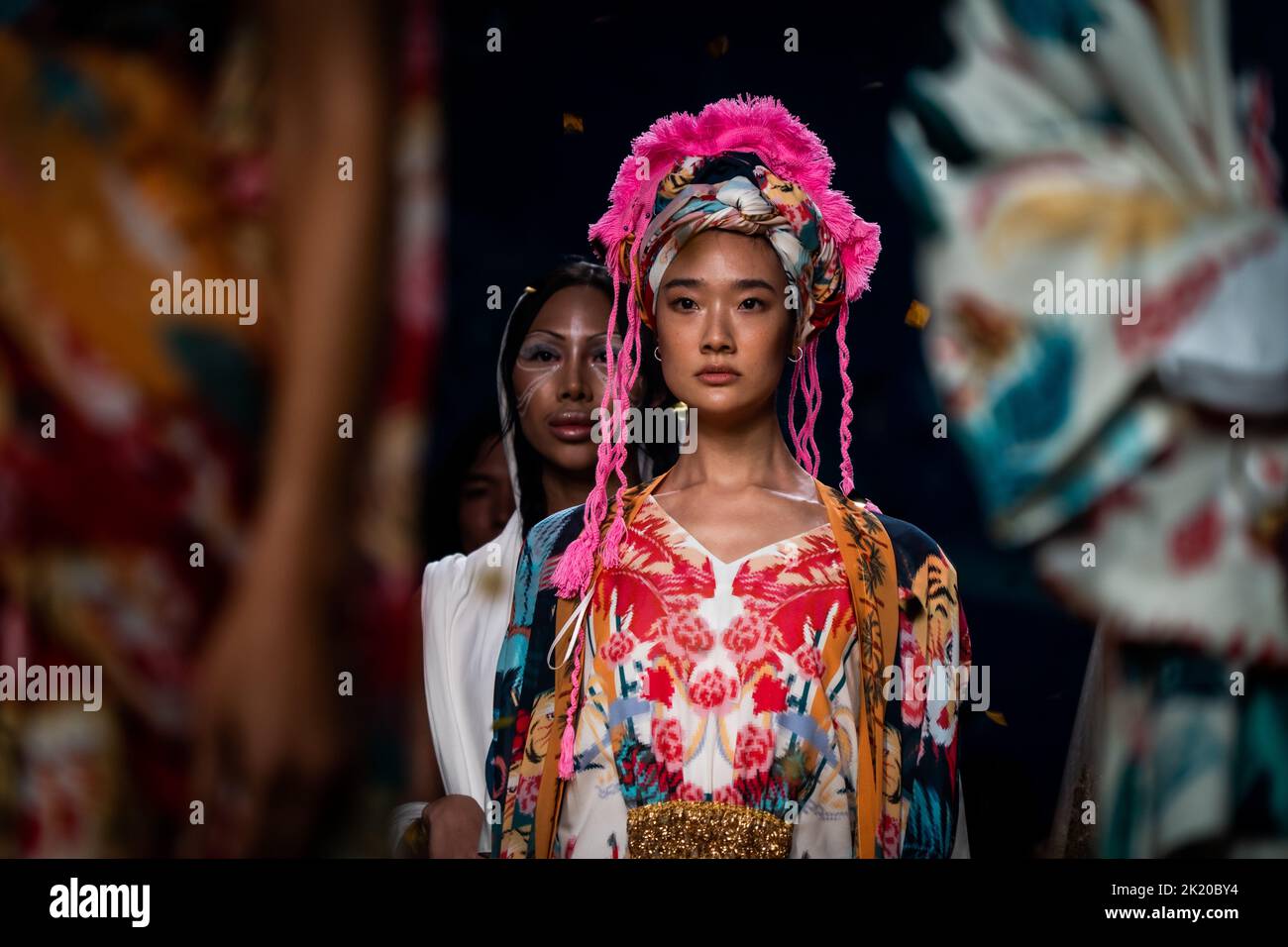 Models walk the runway wearing the latest collection from Thai fashion ...