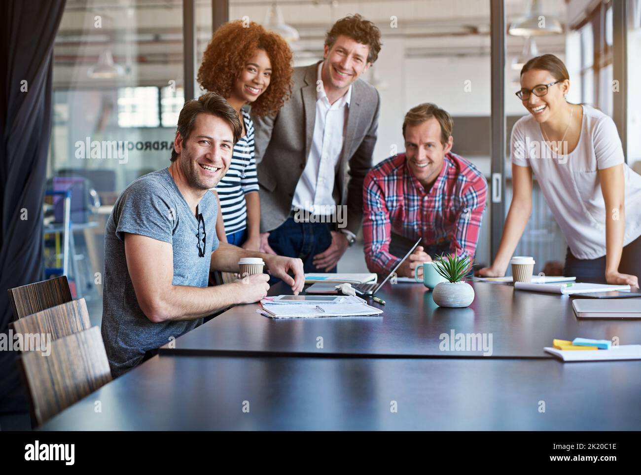 Everybody contributes on this team. Portrait of a group of office ...