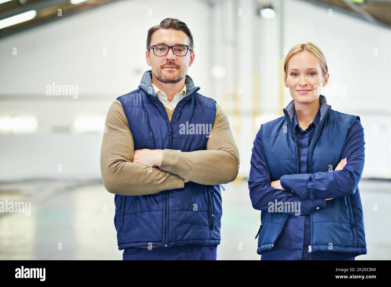 Our warehouse is a well-oiled machine. Portrait of two floor managers ...