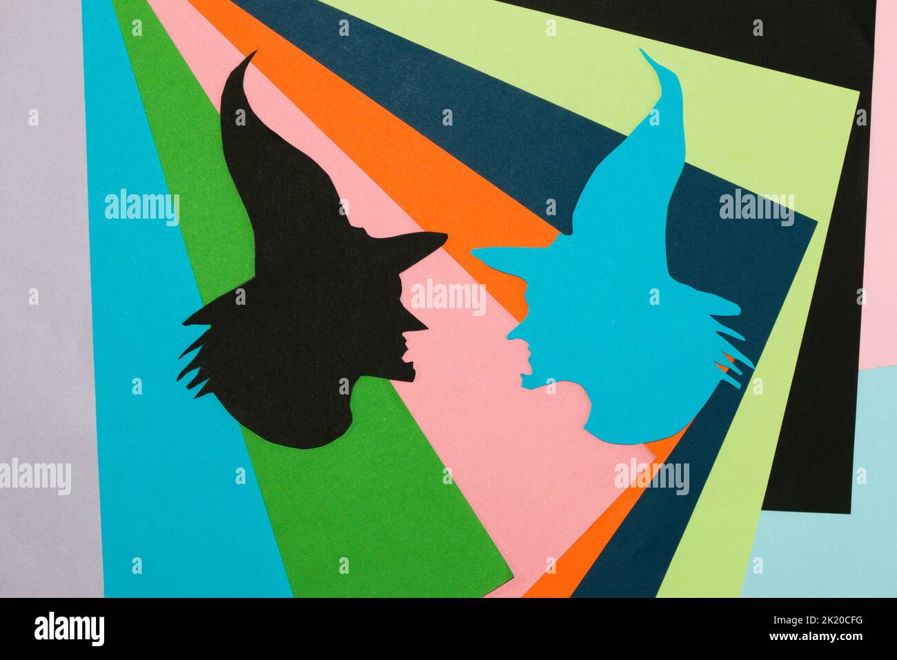 two witch heads on a colorful background, creative art design ...
